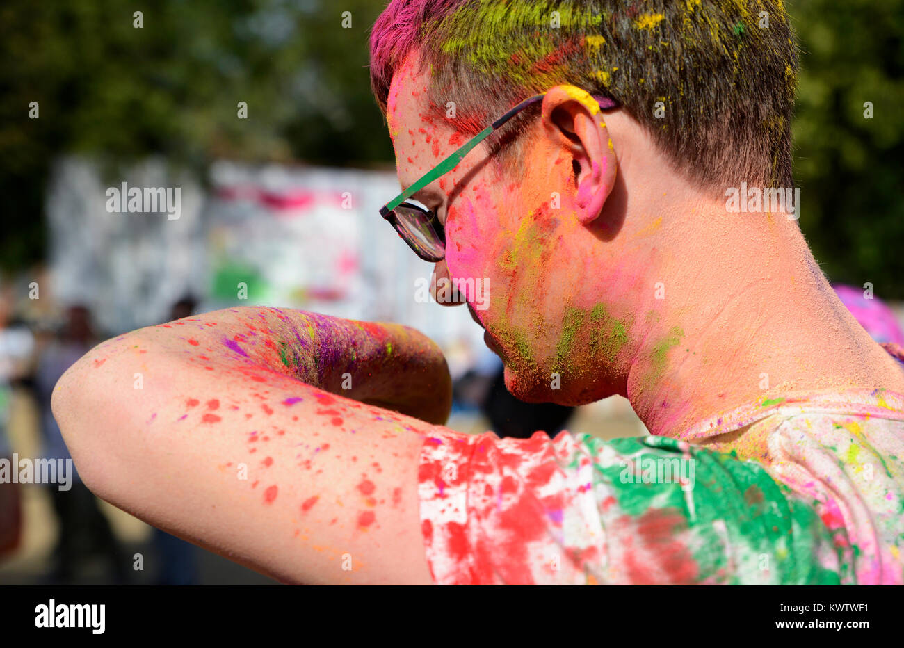 Happy young man on holi color festival Happy young man on holi color ...
