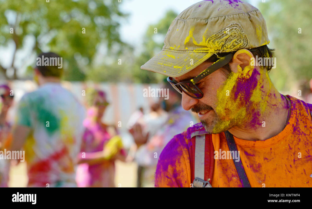 Happy young man on holi color festival Happy young man on holi color ...