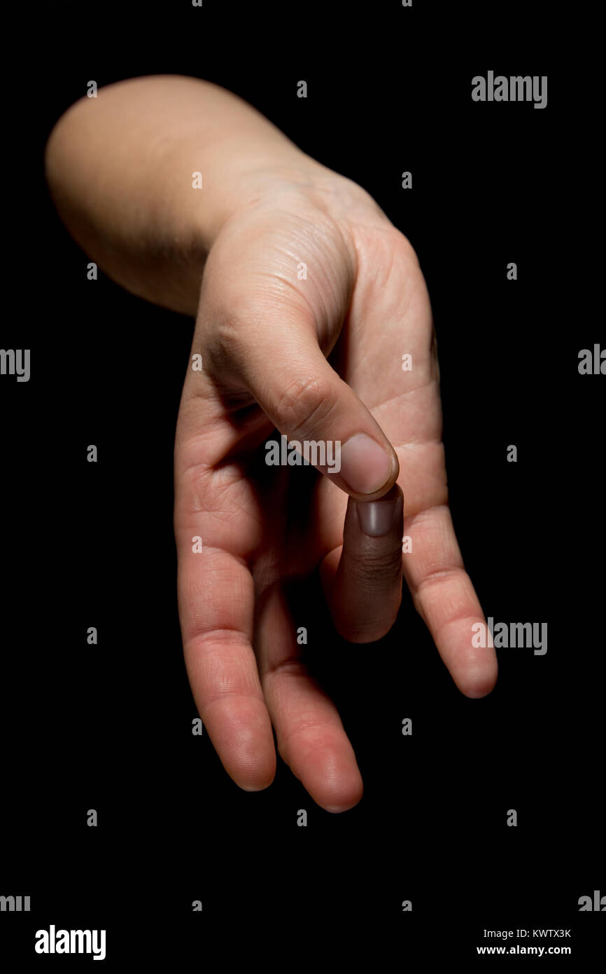 hand in mudra gesture on black background Stock Photo - Alamy