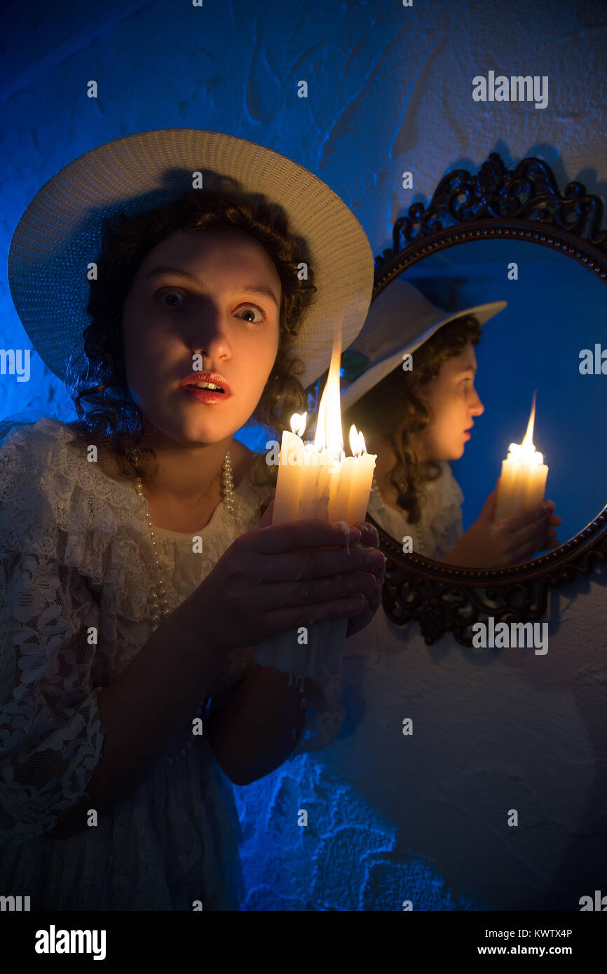 Woman in victorian dress holding hi-res stock photography and images ...