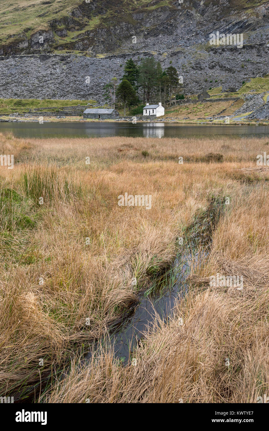 Old quarry buildings beside Llyn Cwmorthin near Blaenau Ffestiniog ...
