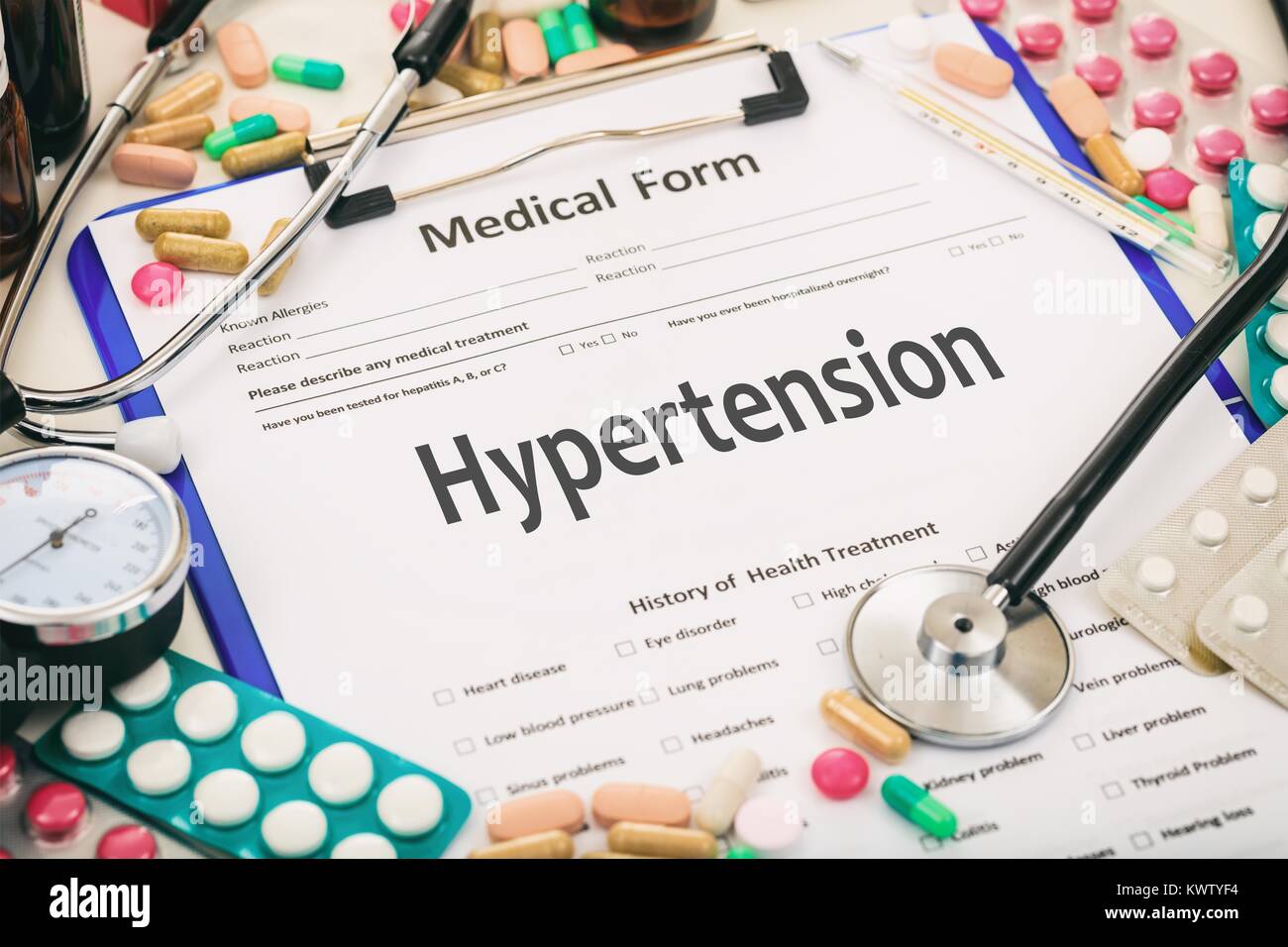 Medical form on a table, diagnosis hypertension Stock Photo - Alamy