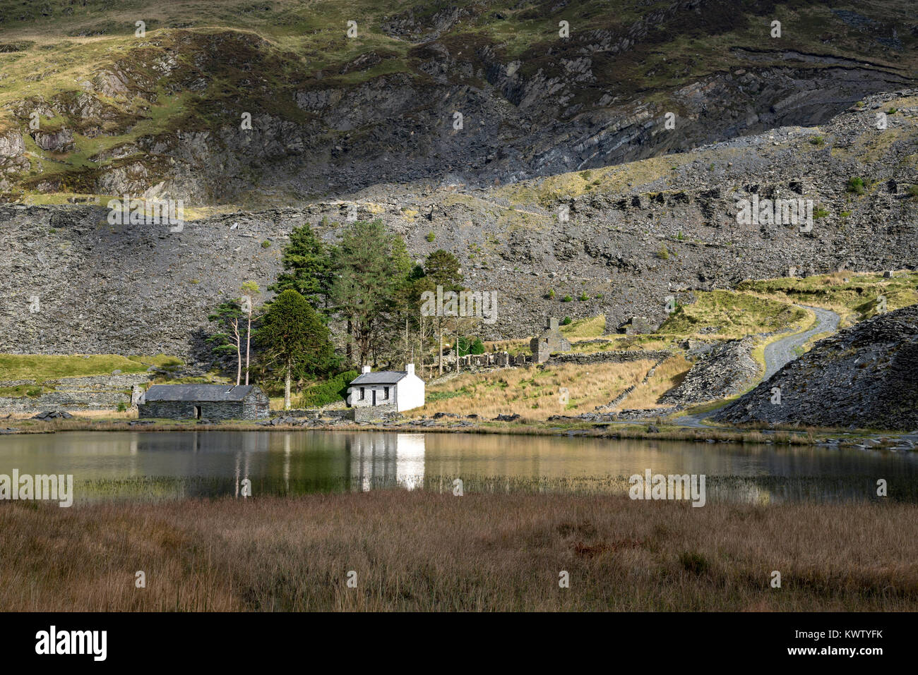 Old quarry buildings beside Llyn Cwmorthin near Blaenau Ffestiniog ...