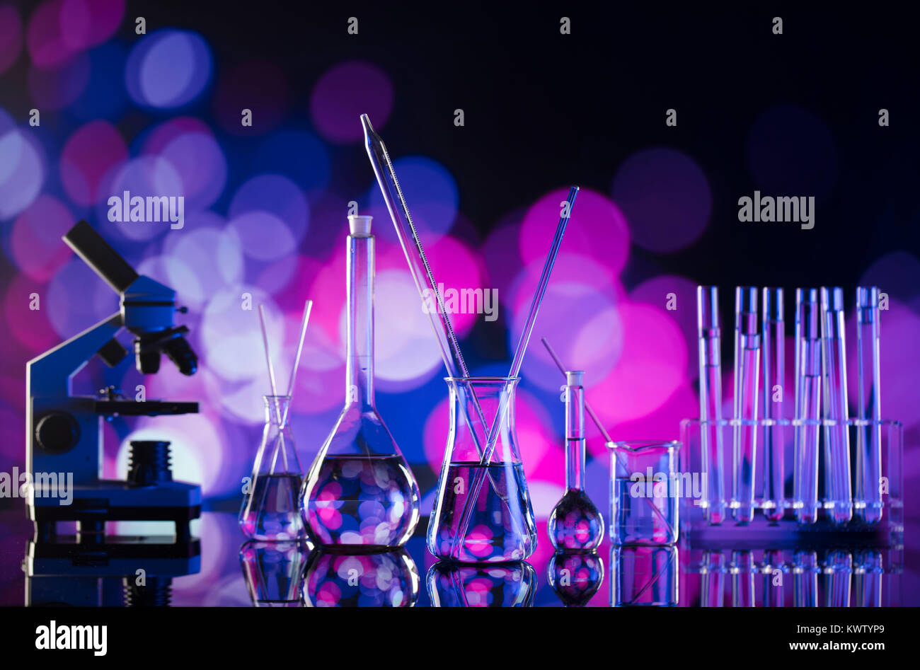 Science experiment concept with bokeh background, laboratory beakers ...