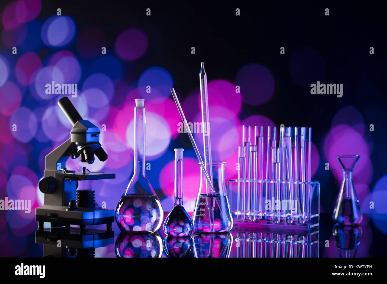 Science experiment concept with bokeh background, laboratory beakers ...