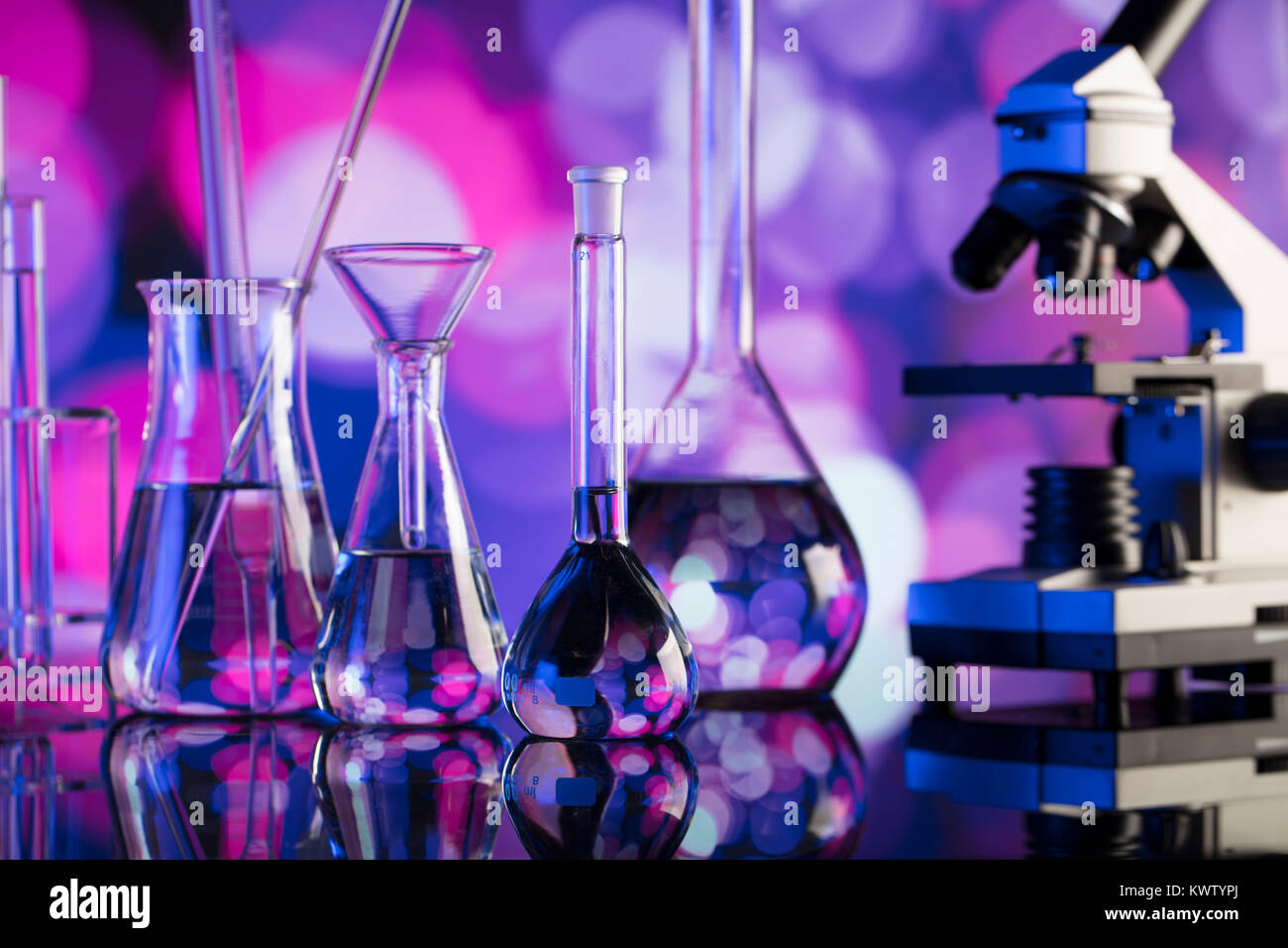 Science experiment concept with bokeh background, laboratory beakers Stock Photo - Alamy