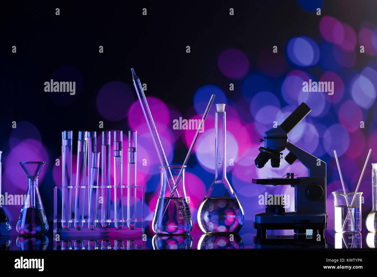 Science experiment concept with bokeh background, laboratory beakers ...