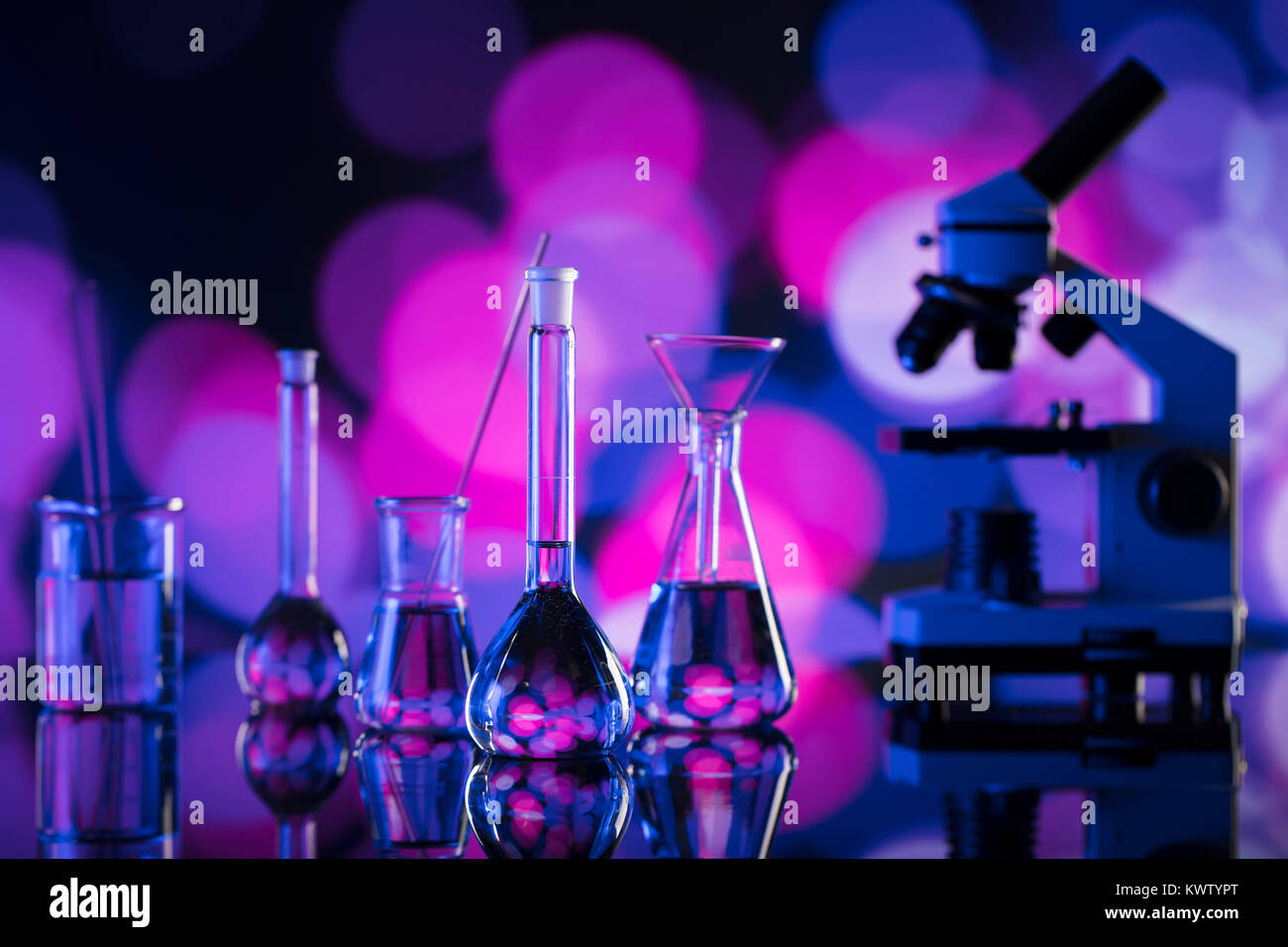 Science experiment concept with bokeh background, laboratory beakers ...