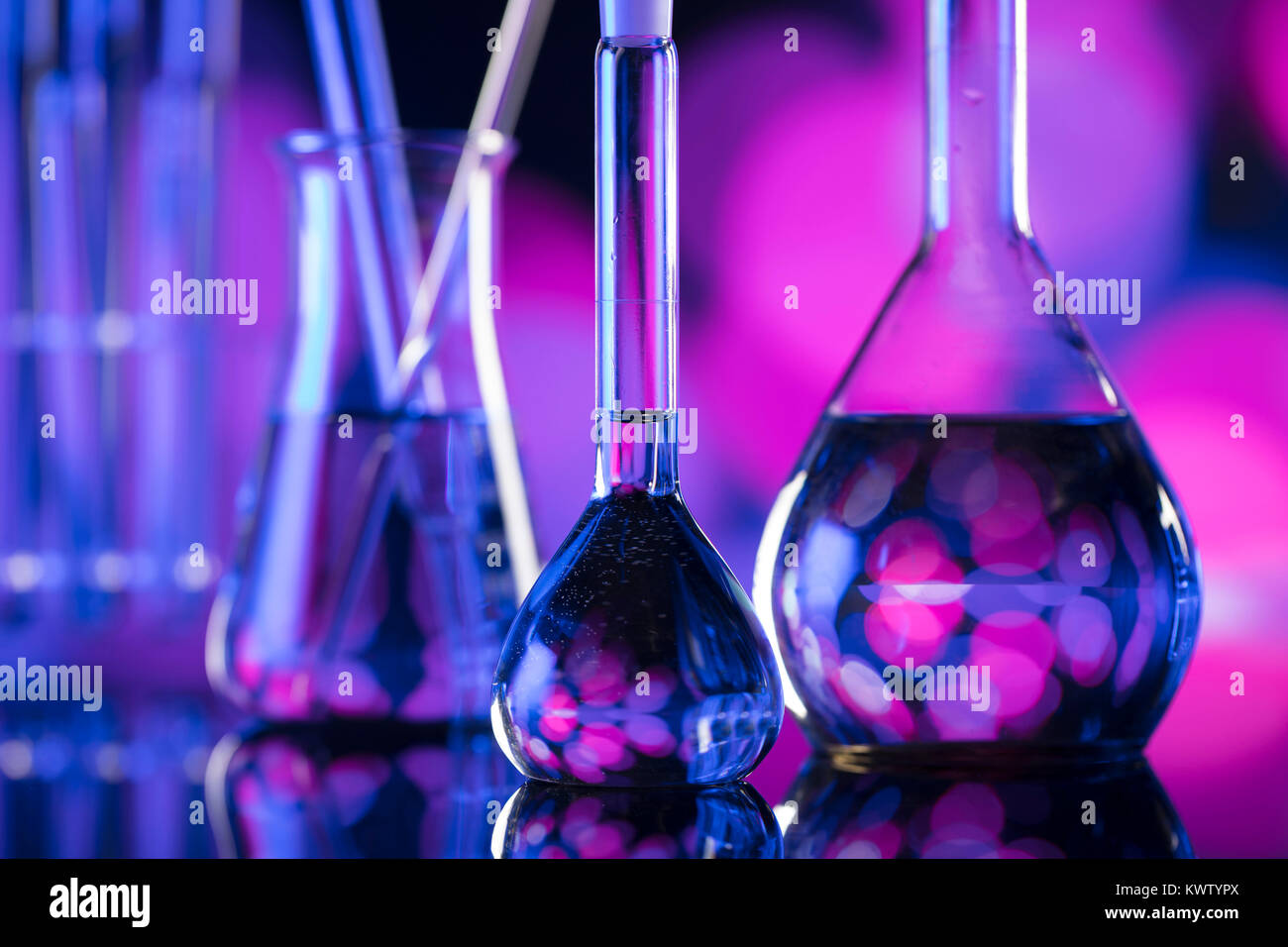 Science experiment concept with bokeh background, laboratory beakers ...