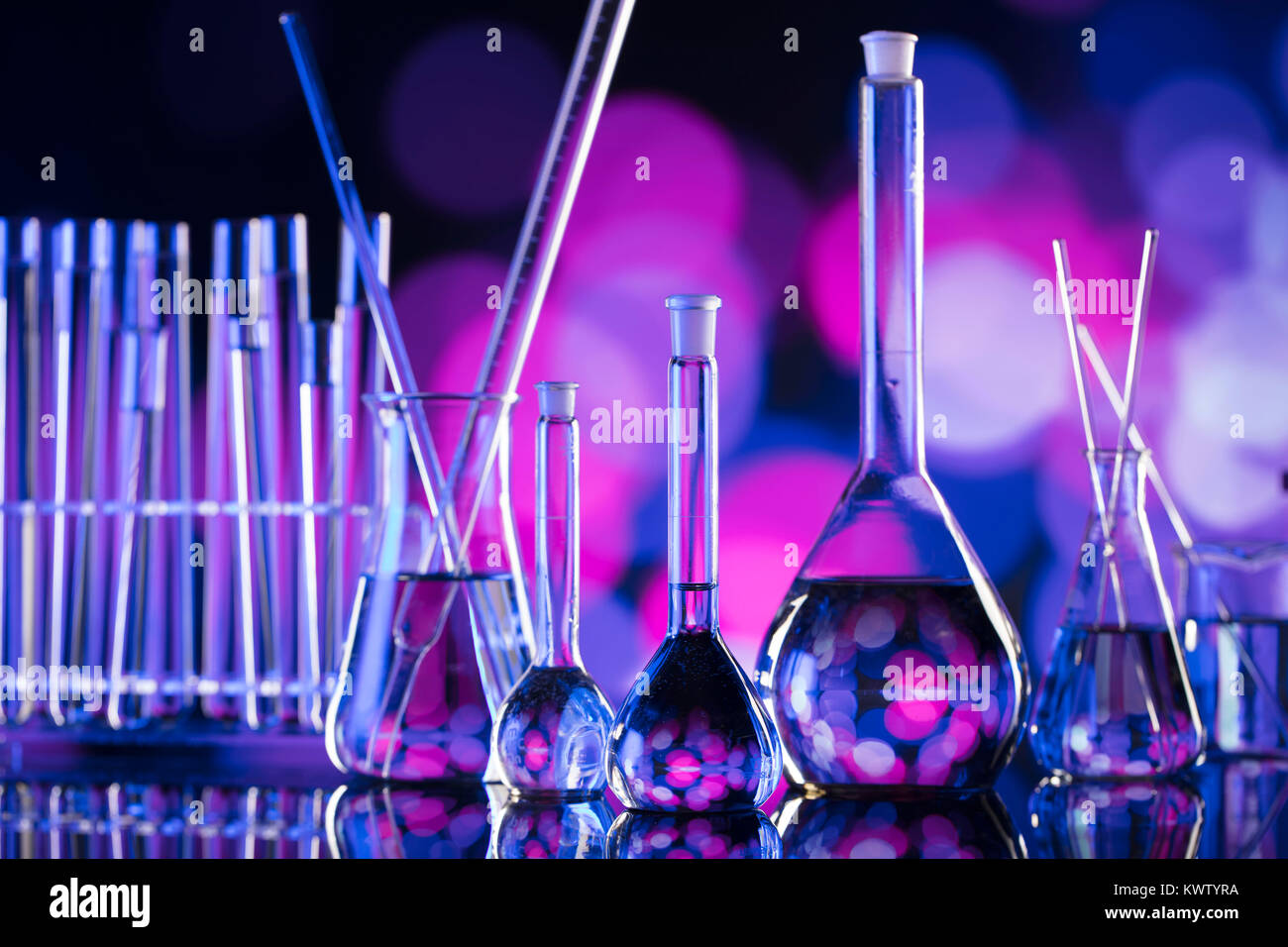 Science experiment concept with bokeh background, laboratory beakers ...
