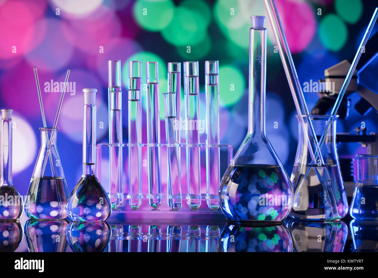 Science experiment concept with bokeh background, laboratory beakers ...