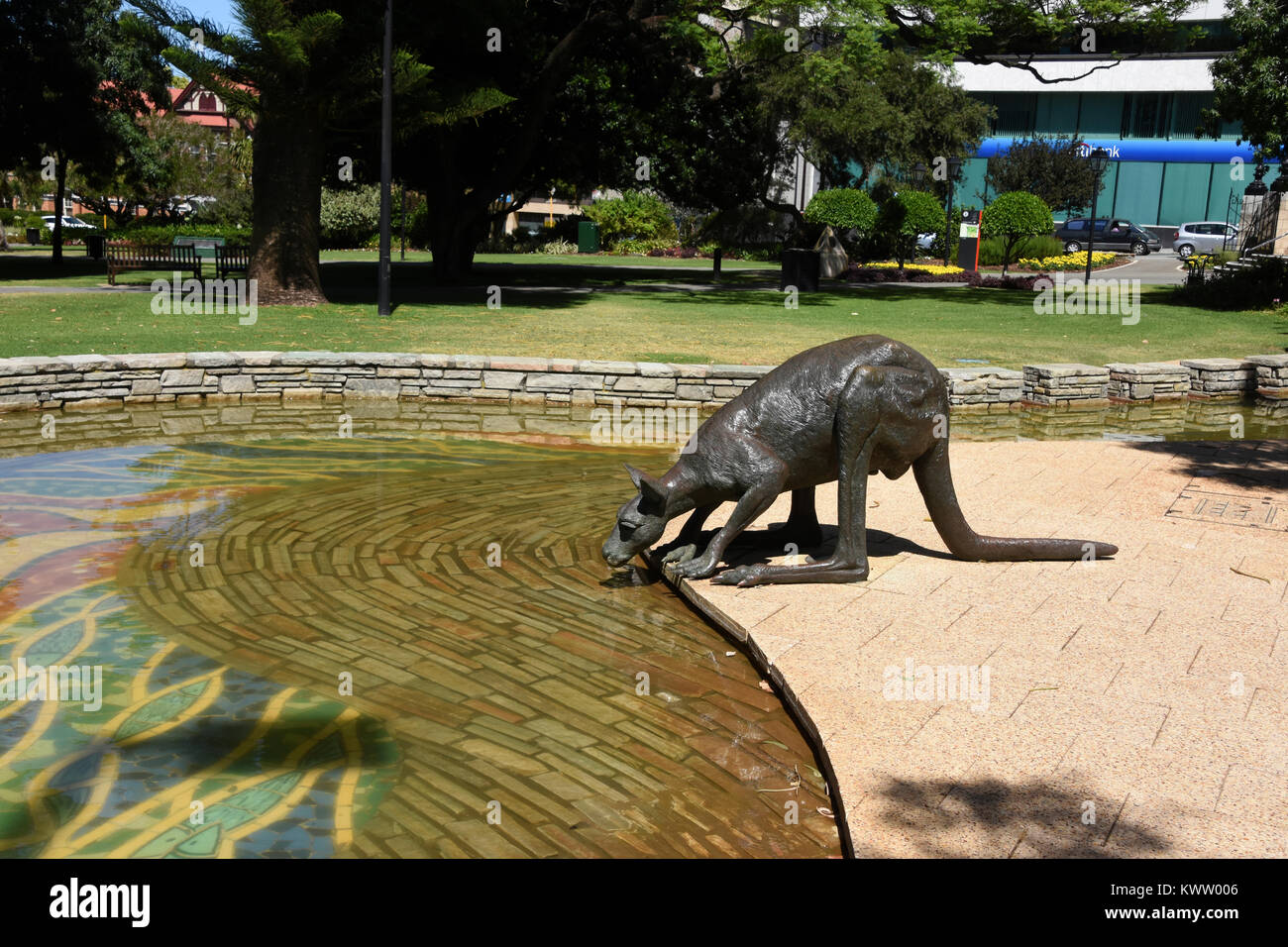 Kangaroo Sculpture drinking water from a stream Stock Photo - Alamy