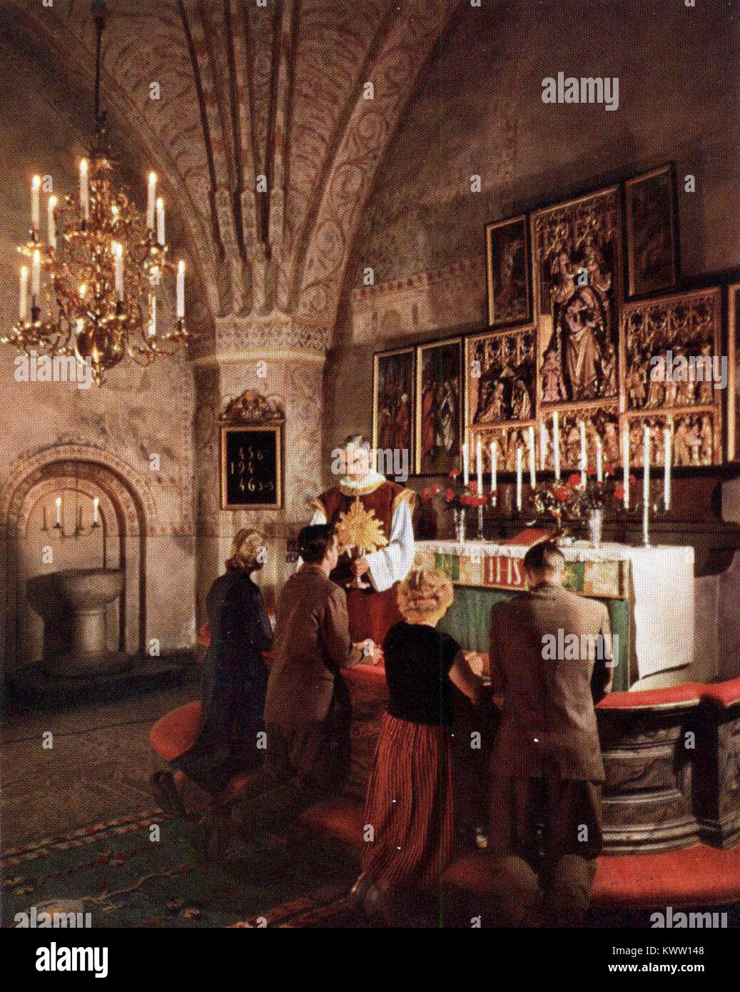 The image portrays a church in Rosunda during a communion service. The ...