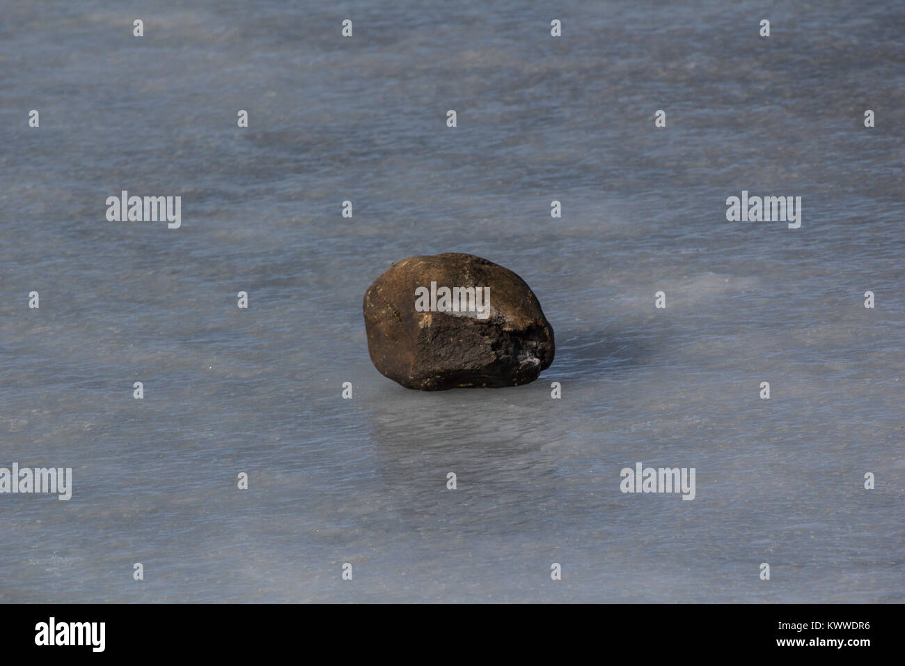 Frozen over pond Stock Photo - Alamy