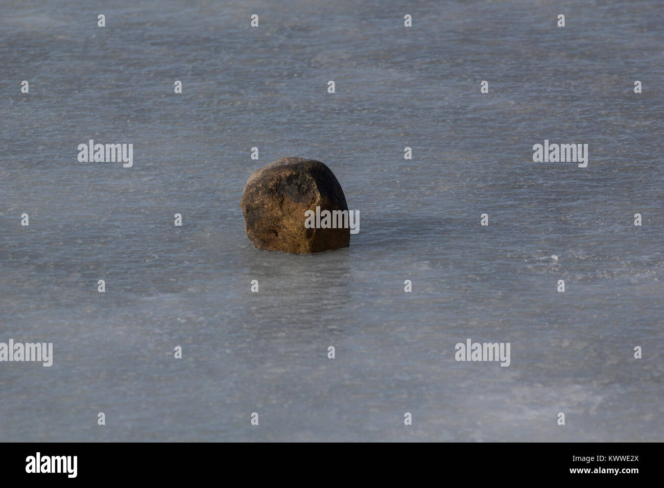 Frozen over pond Stock Photo - Alamy