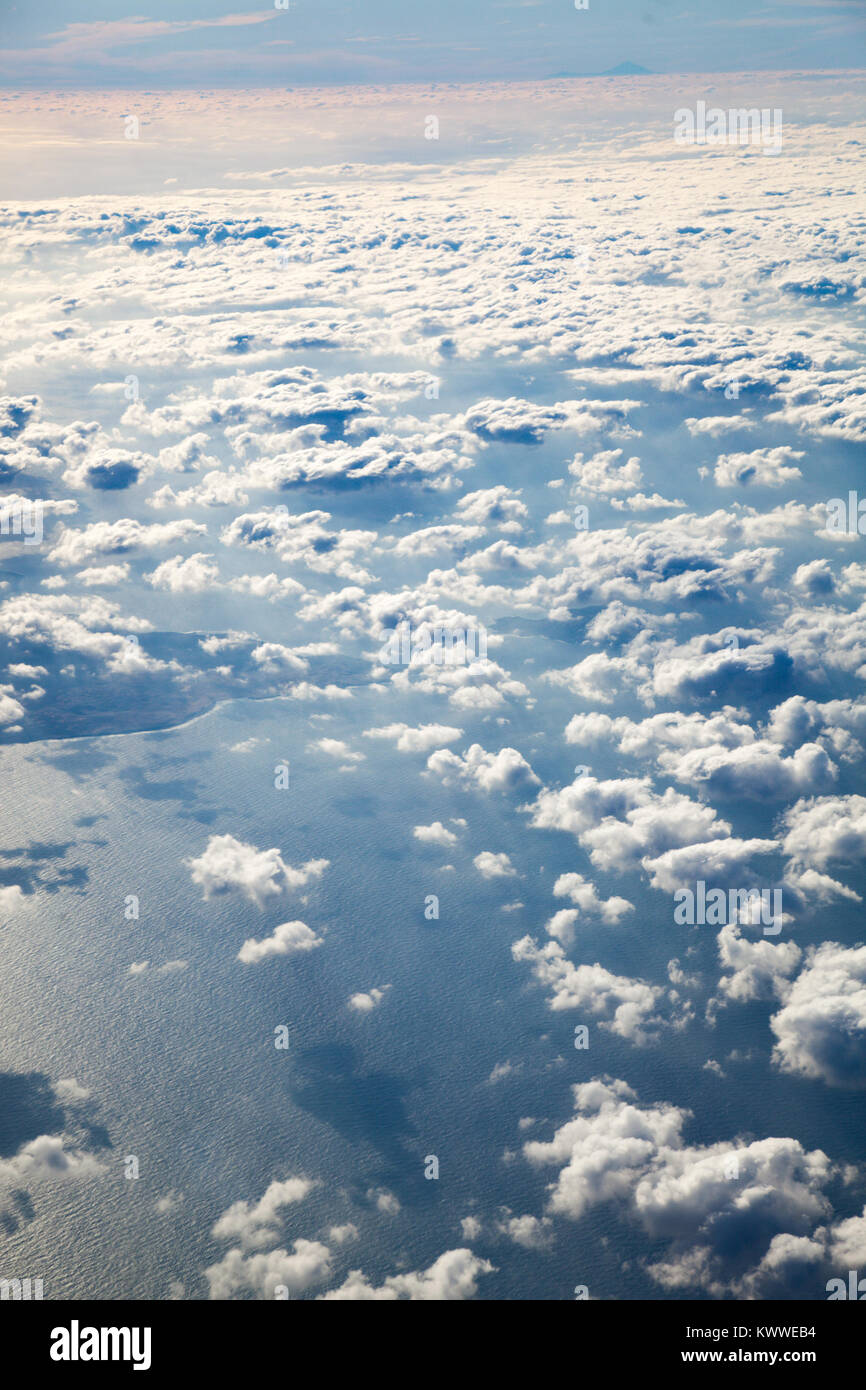 A view of the earth with clouds and the surface of the stratosphere ...