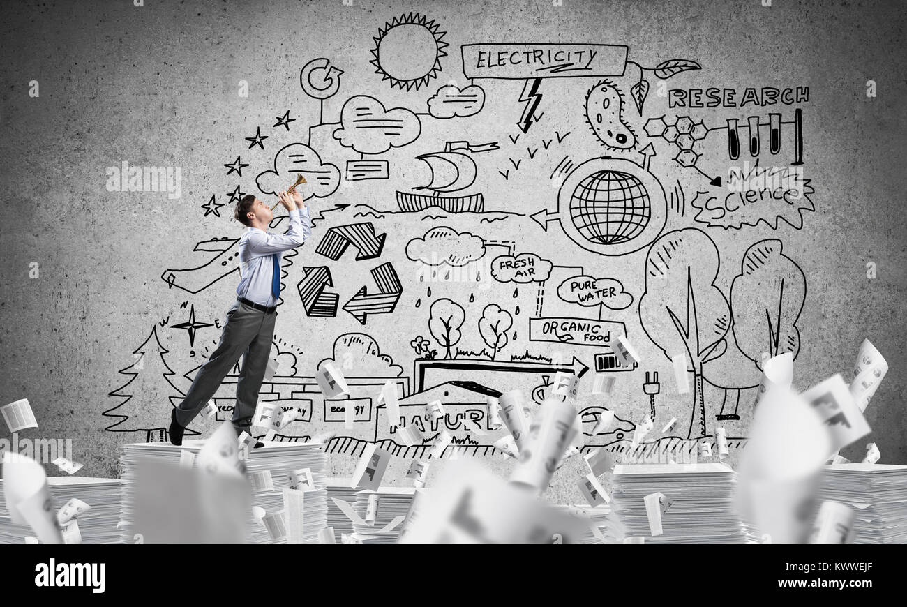 Happy businessman playing fife Stock Photo - Alamy