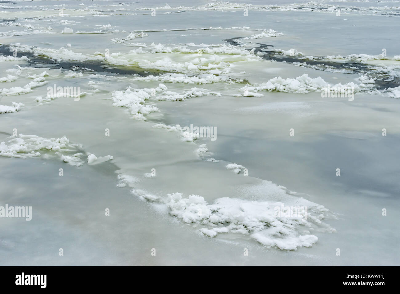 Ice formations on Ukrainian river Dnipro in center of the same name ...