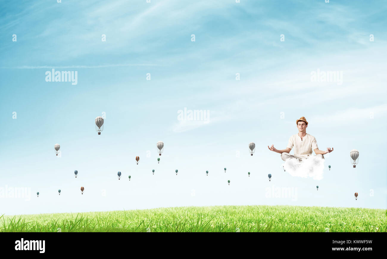 Young man keeping mind conscious Stock Photo - Alamy