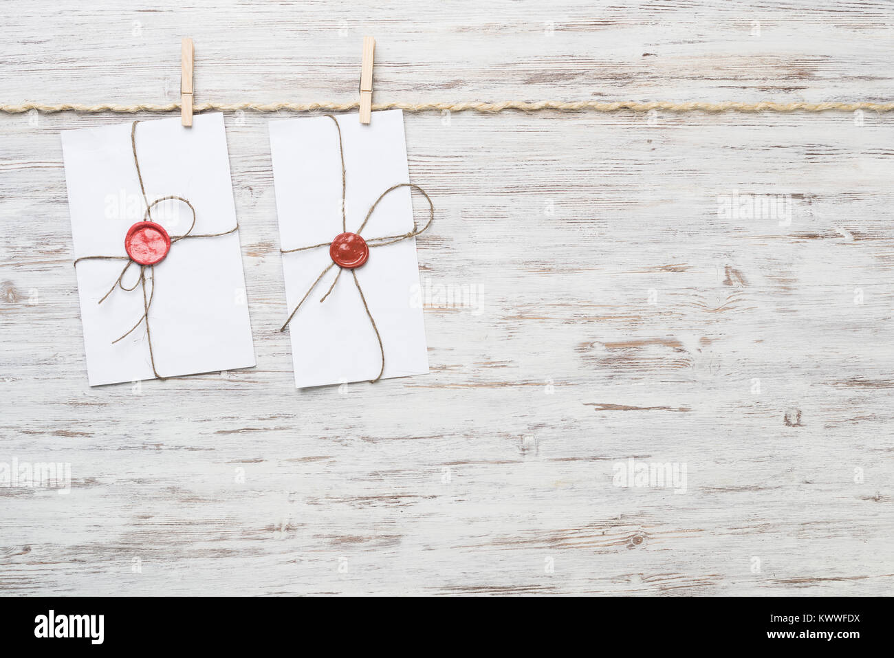 Mail envelope on rope Stock Photo - Alamy