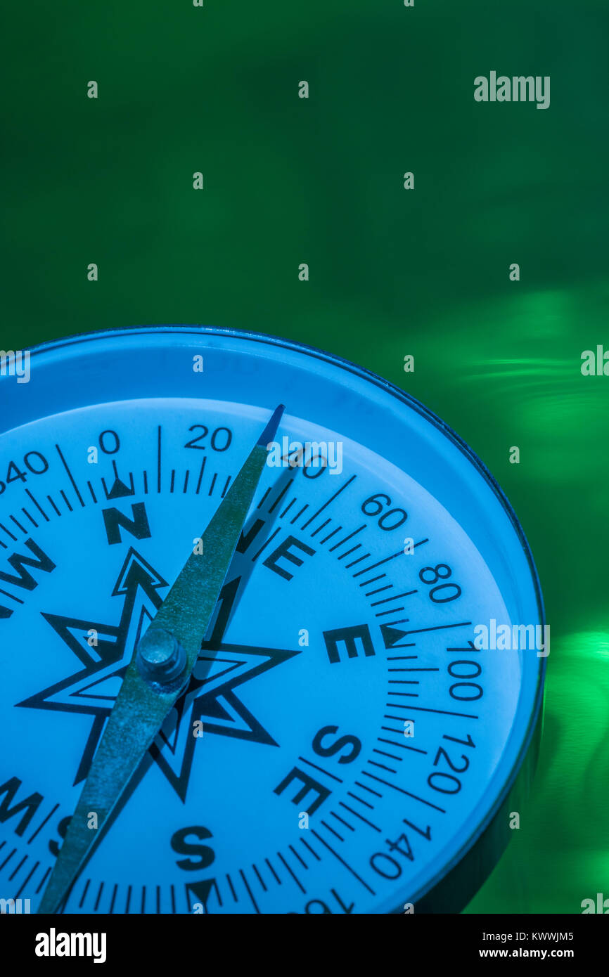Macro-photo of compass rose face with needle - with copy space. Concept ...