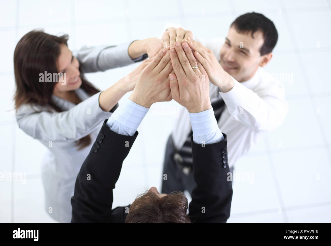 concept of team work: friendly business team Stock Photo - Alamy