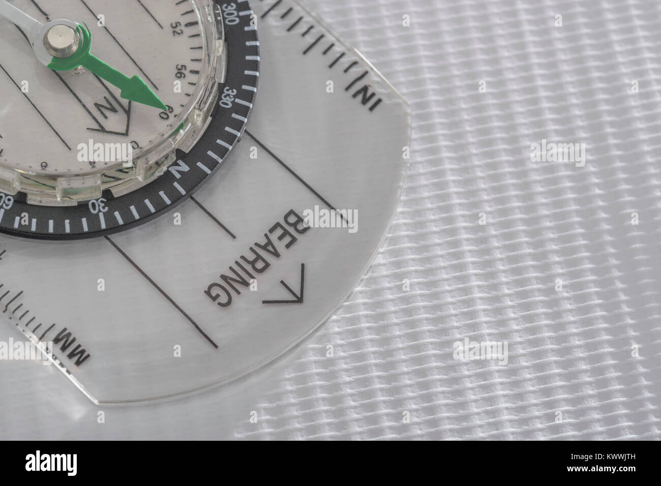 Macro-photo of compass rose face with needle - with copy space. North ...