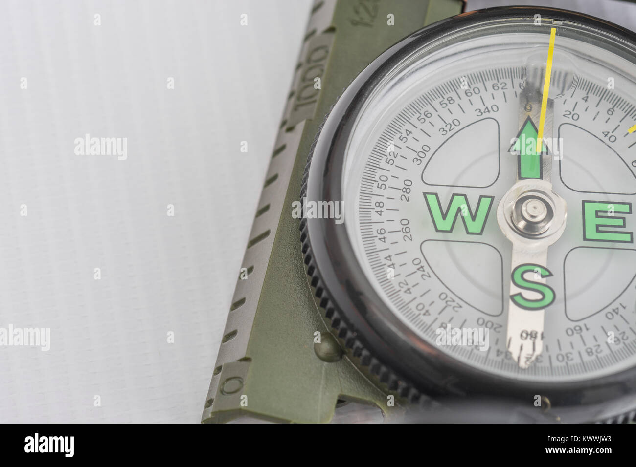 Macro-photo of compass rose face with needle - with copy space. North ...