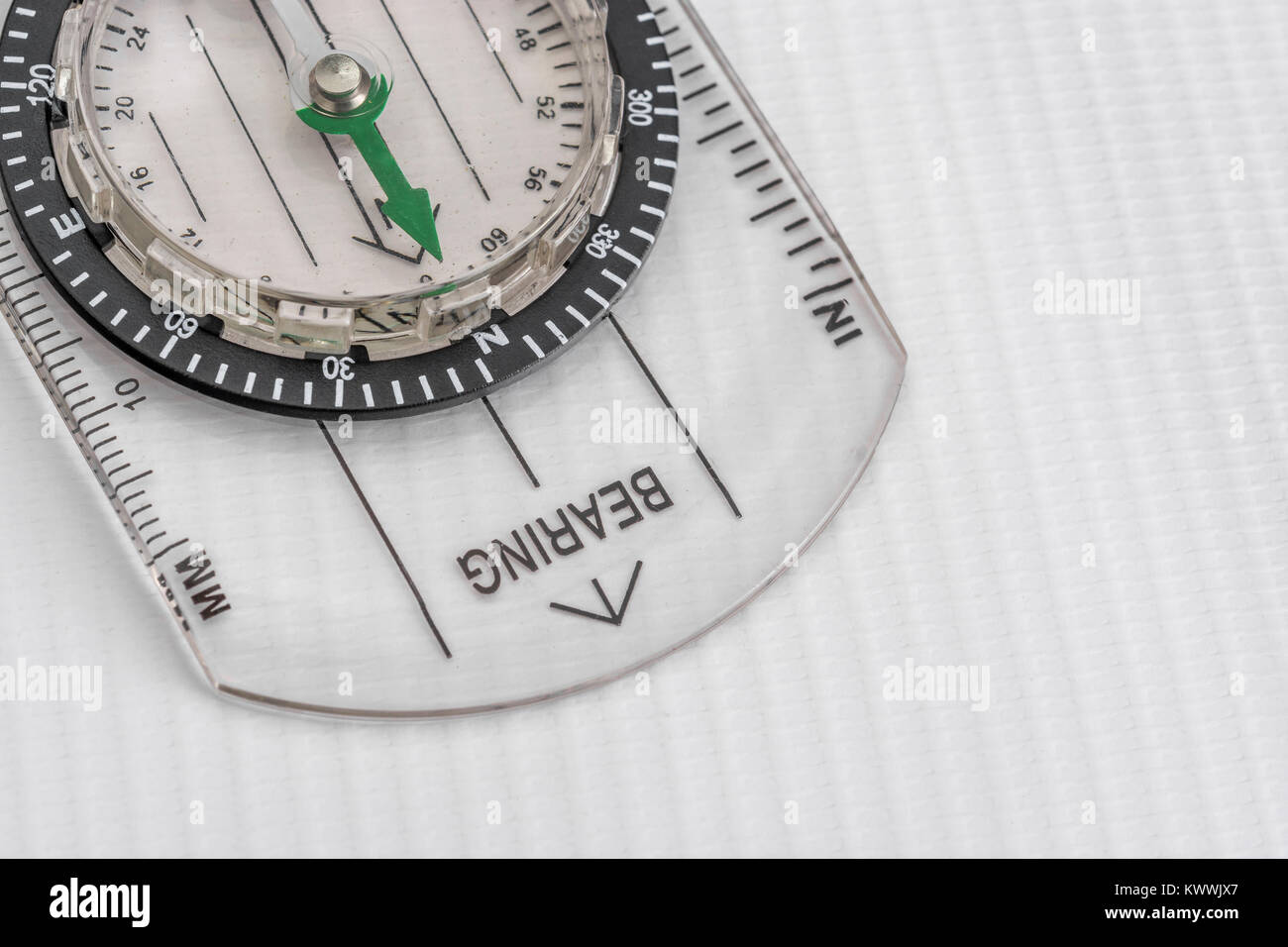 Macro-photo of compass rose face with needle - with copy space. North ...