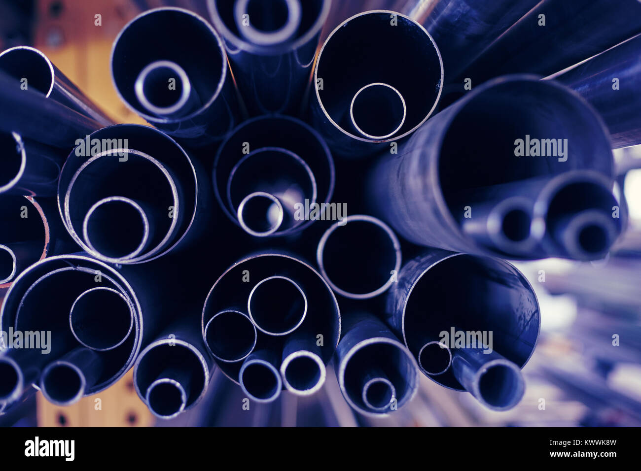 a black metal pipes of various profiles Stock Photo - Alamy