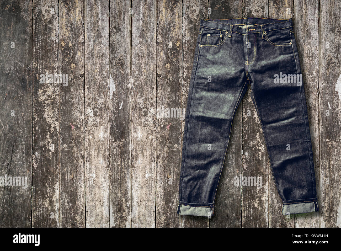 Folded denim on floor hi-res stock photography and images - Alamy