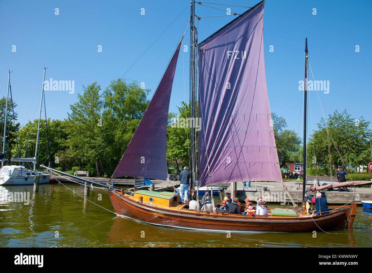 Zeesenboot, a traditional wooden sailing boat at the harbour of Wustrow ...