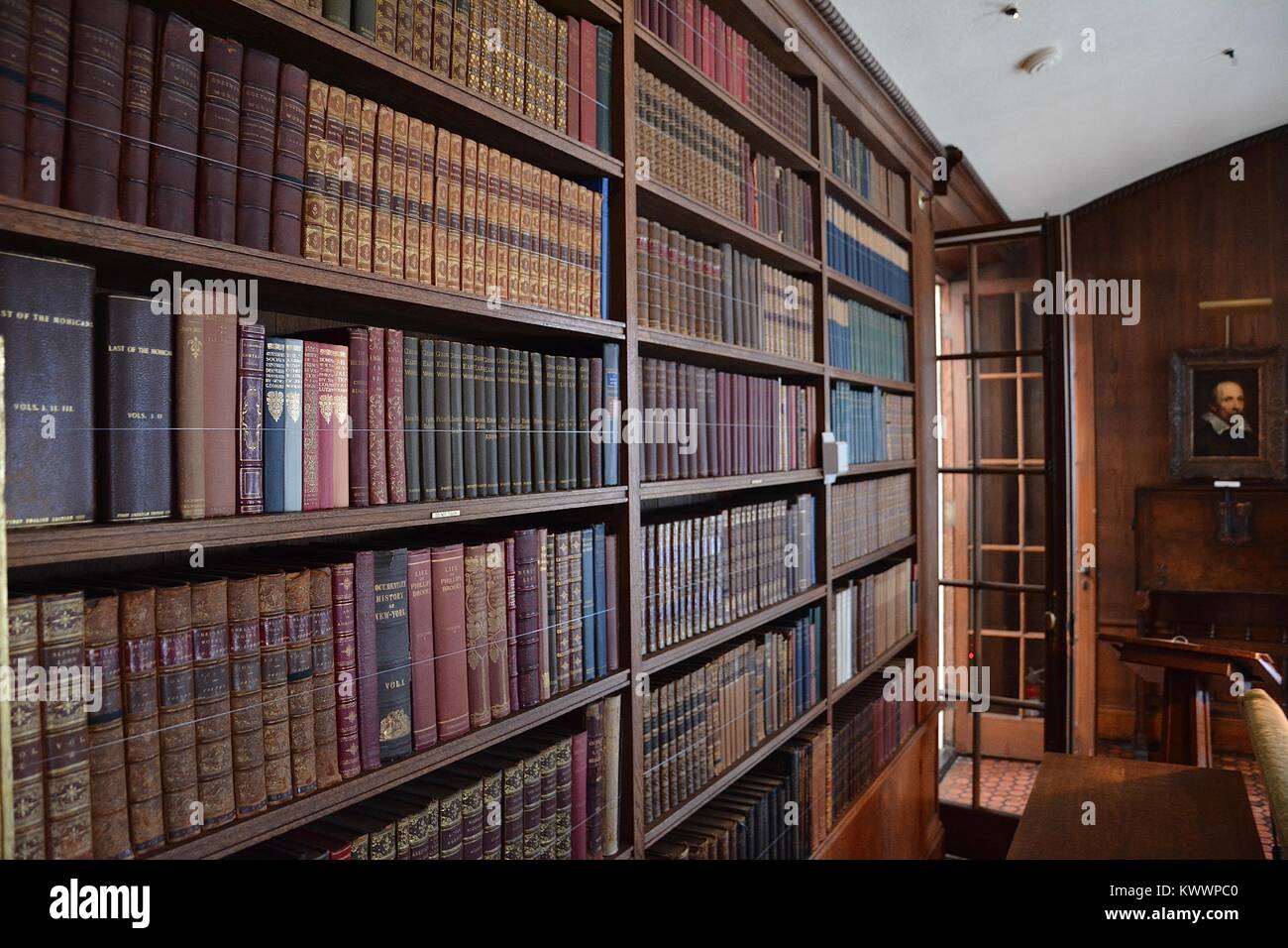 An antique and historical library containing many old leather-bound ...