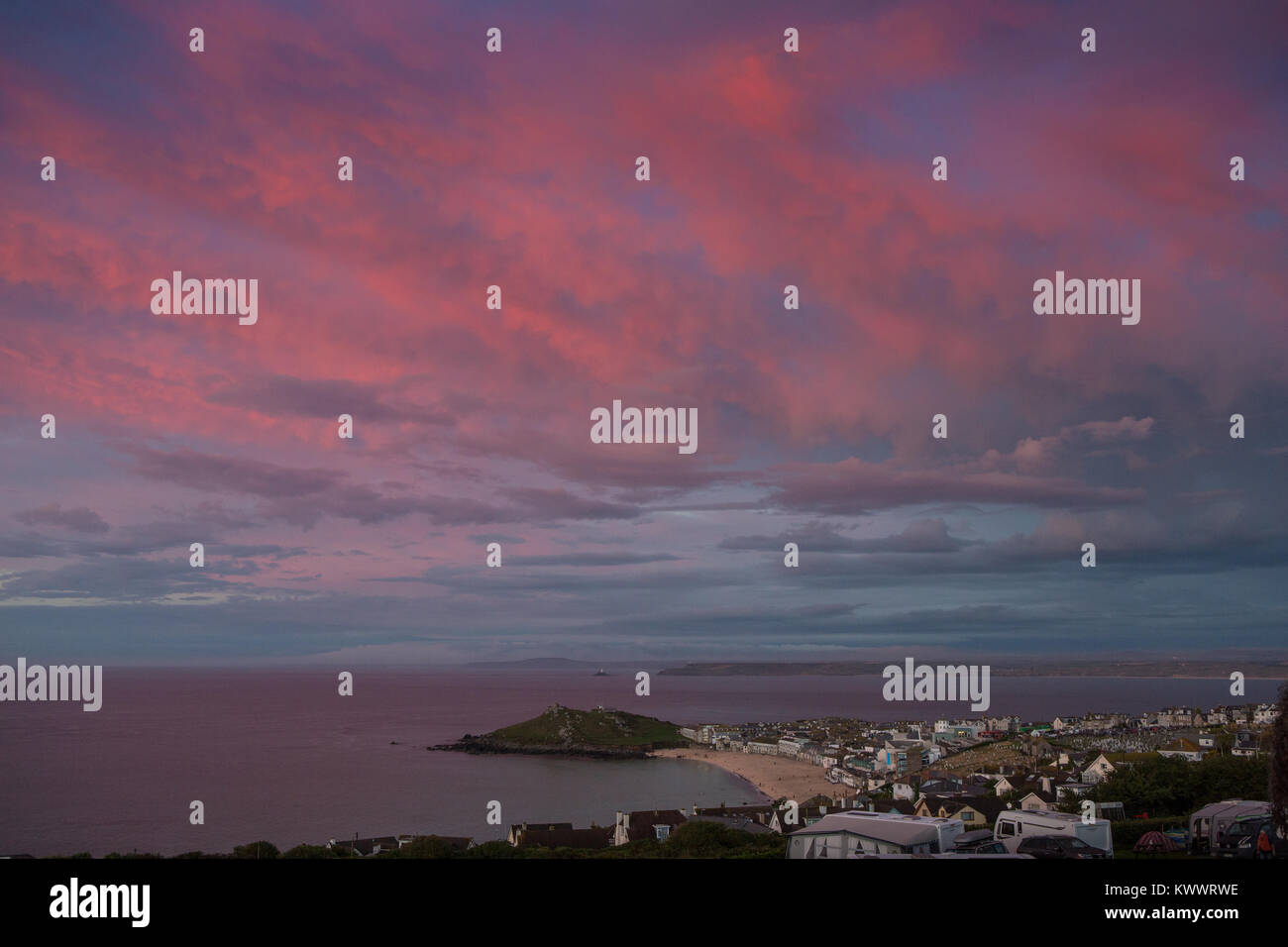 Moody light over St Ives in Cornwall. Porthmeor beach at sunset Stock ...