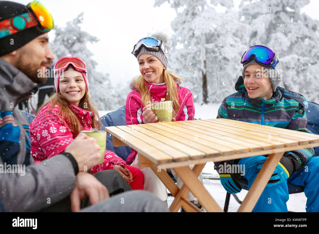 Family enjoying tea in cafe hi-res stock photography and images - Alamy