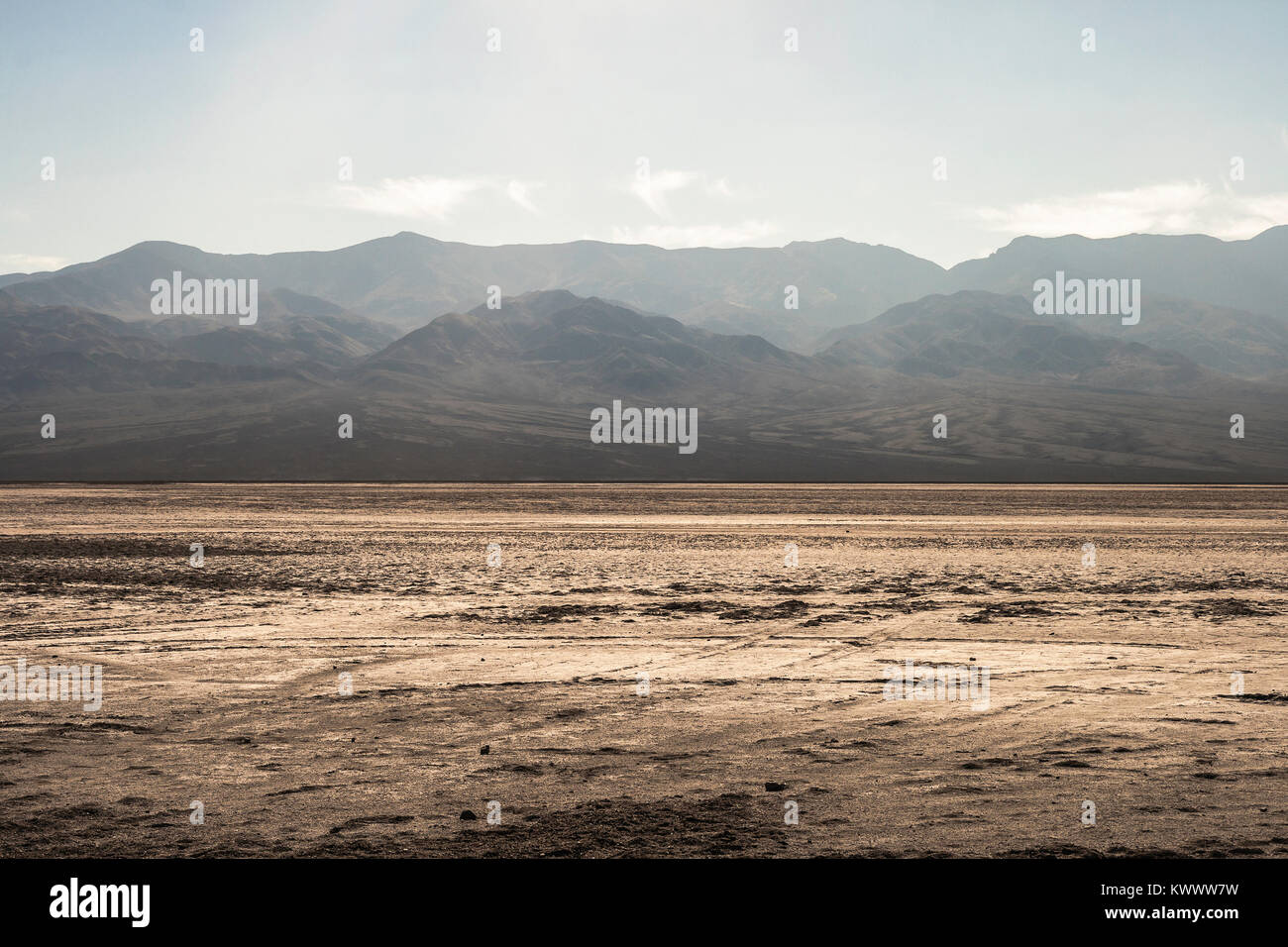 Salt flats desert at Badwater Basin in Death Valley National Park on a ...