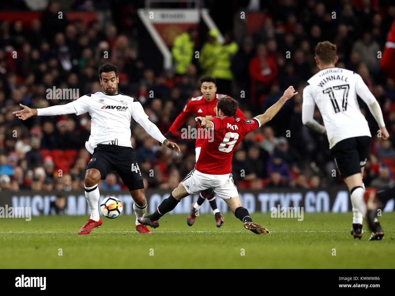 Derby County's Tom Huddlestone (left) and Manchester United's Juan Mata ...