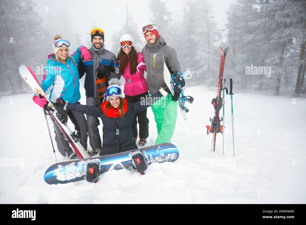Young group of skiers on skiing in mountain Stock Photo - Alamy