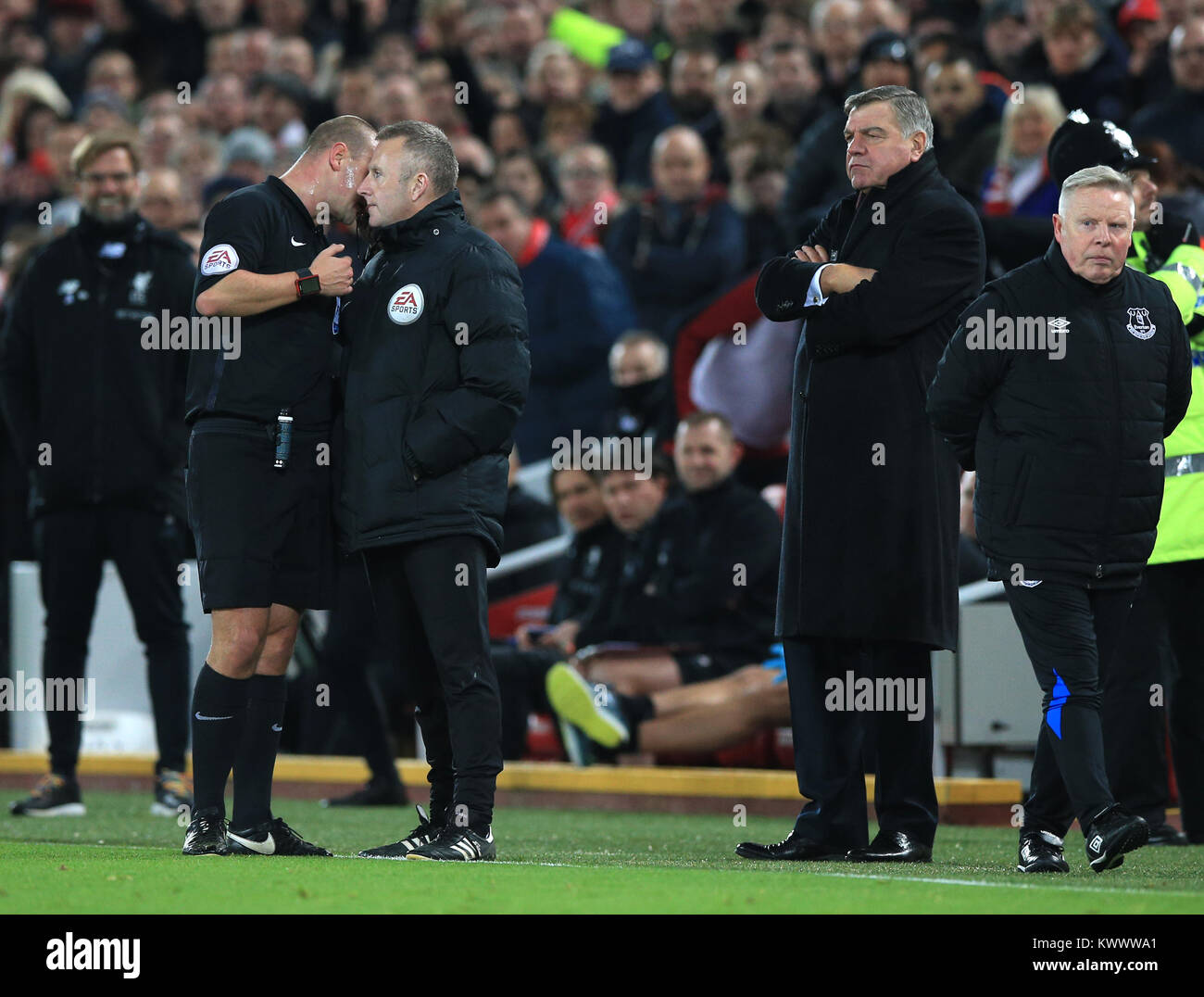 referee Bobby Madley (left) speaks to the fourth official during the FA ...