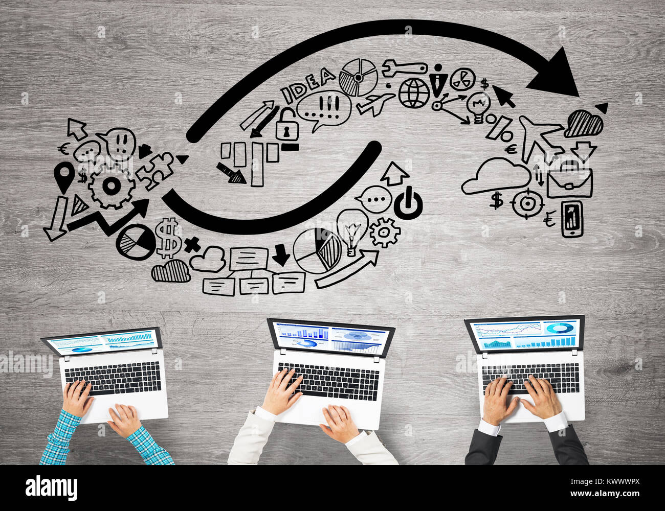 Group of people with devices in hands working together as symbol of ...