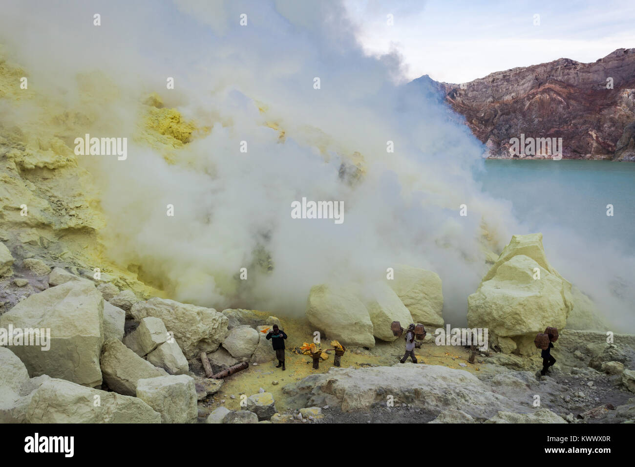 Sulfur miners inside crater of Ijen volcano, East Java, Indonesia Stock ...