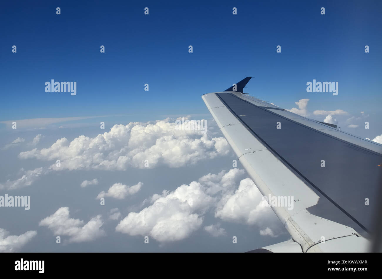View from a plane to its wing during the flight above the clouds Stock ...