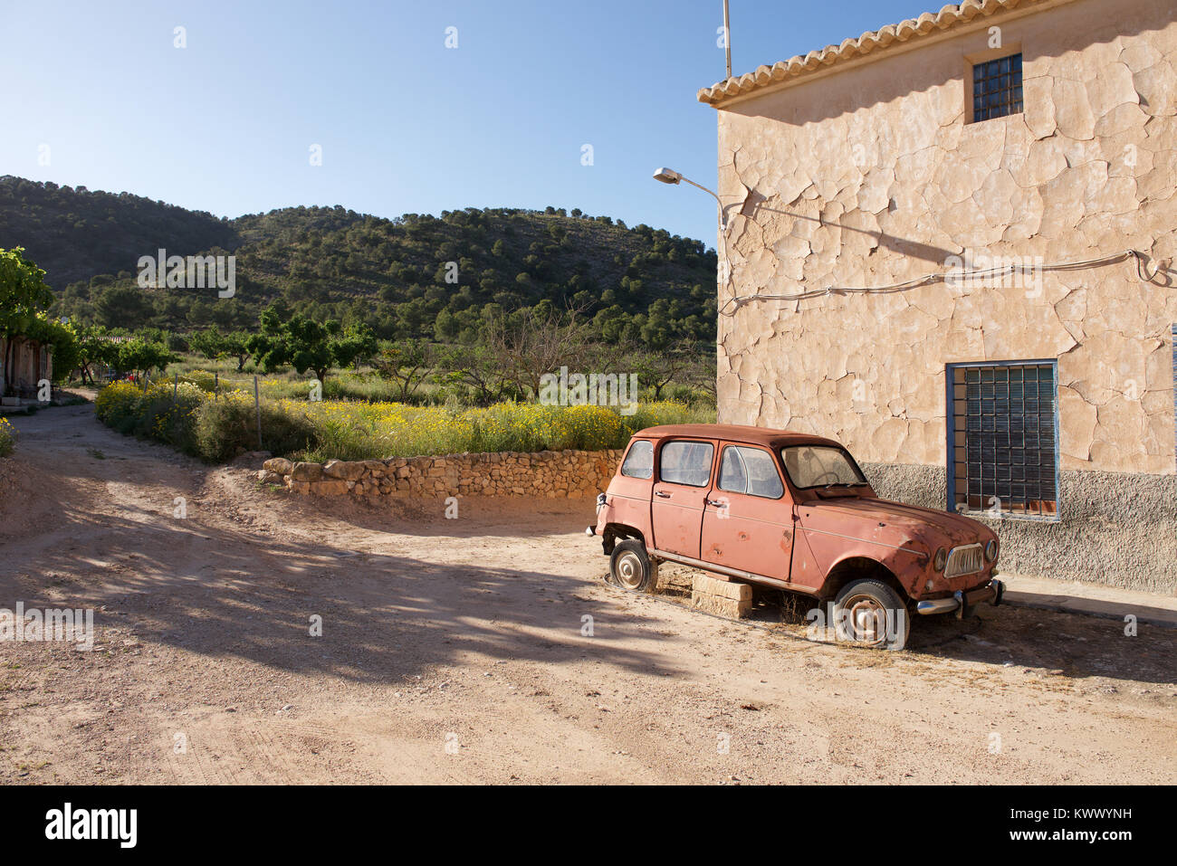 Landscape fields and old house and old car Stock Photo - Alamy