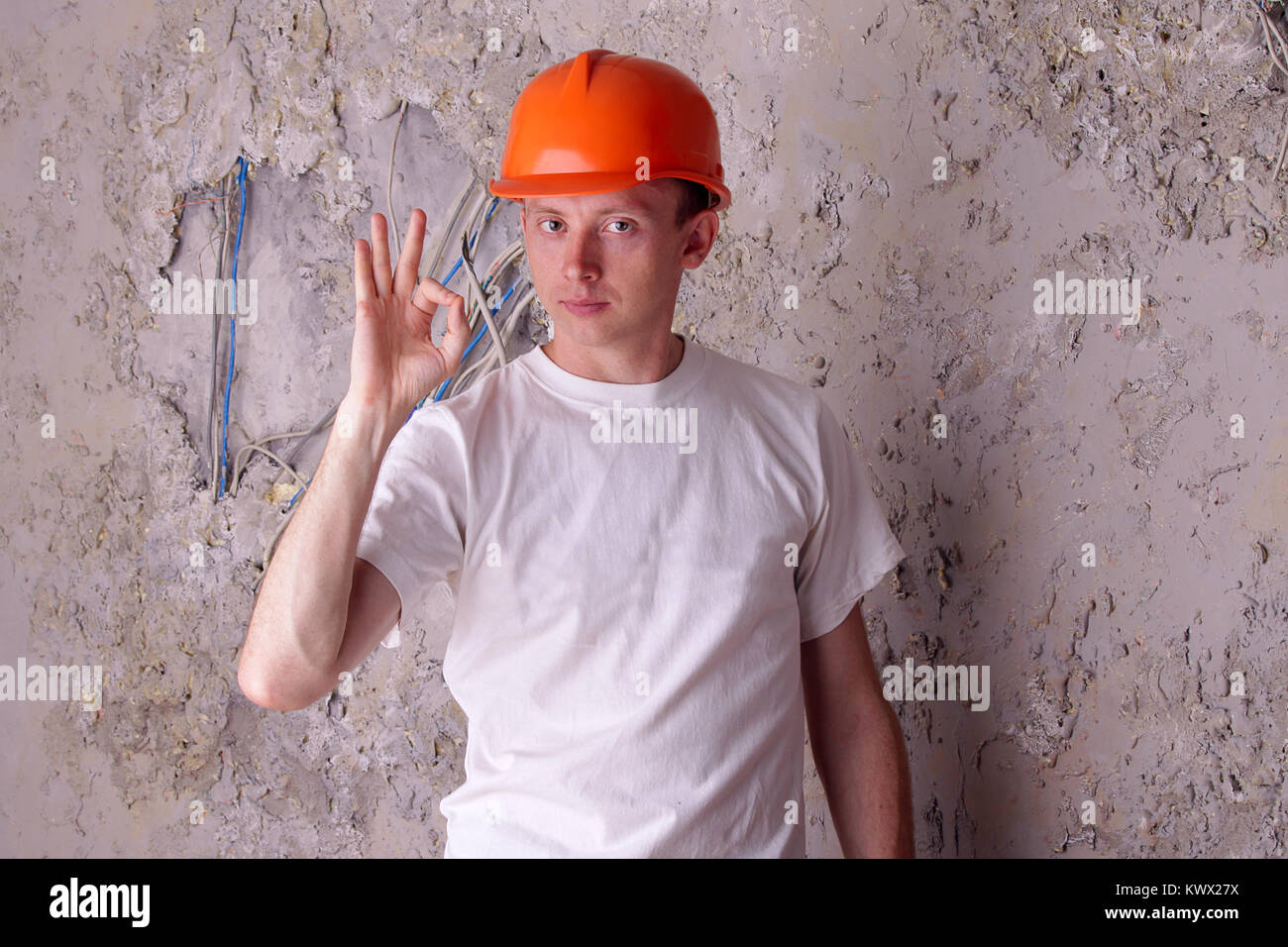 Work electrician shows approx - ok. Job well done Stock Photo - Alamy