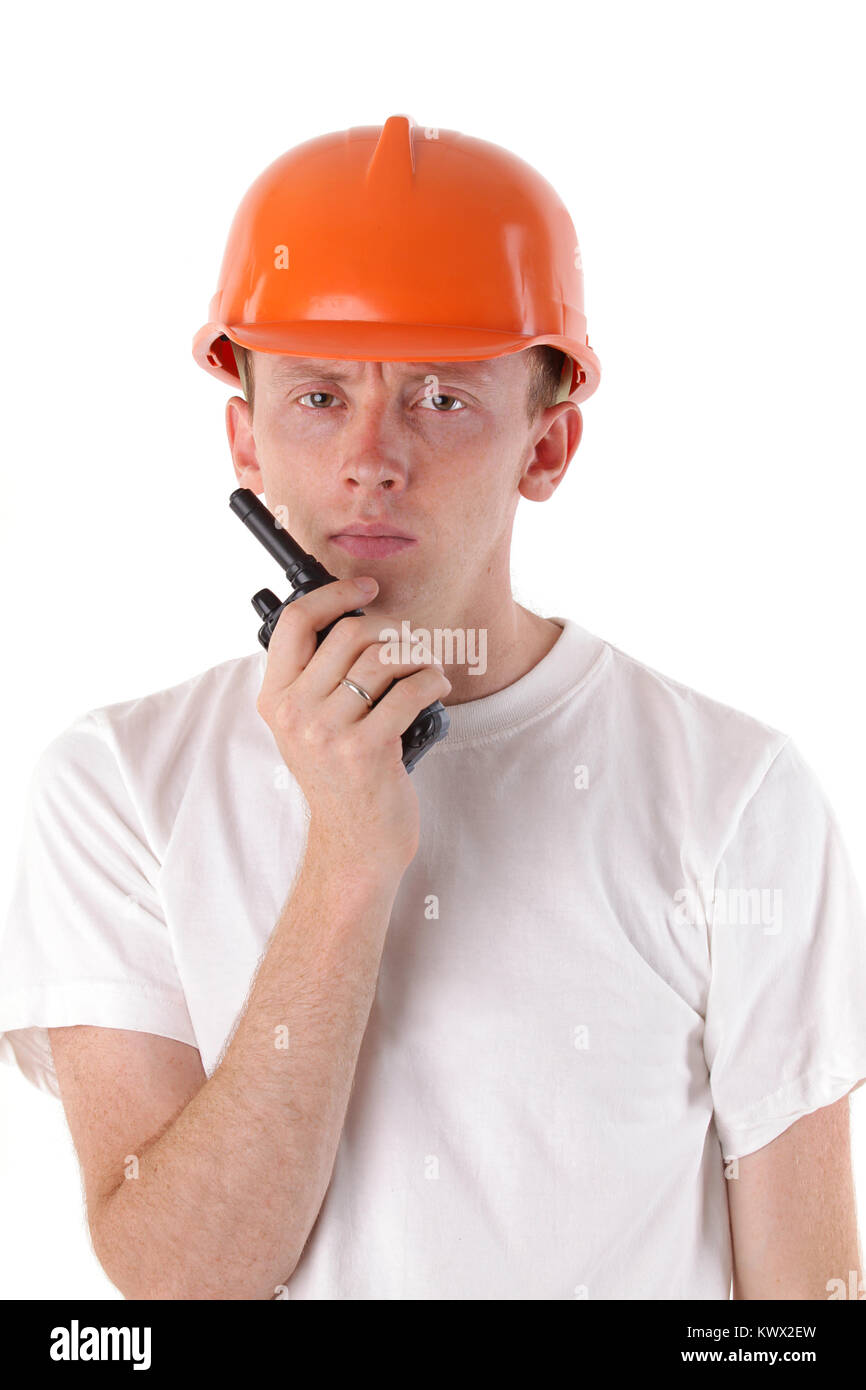 workman talking on portable UHF radio transceiver Stock Photo - Alamy