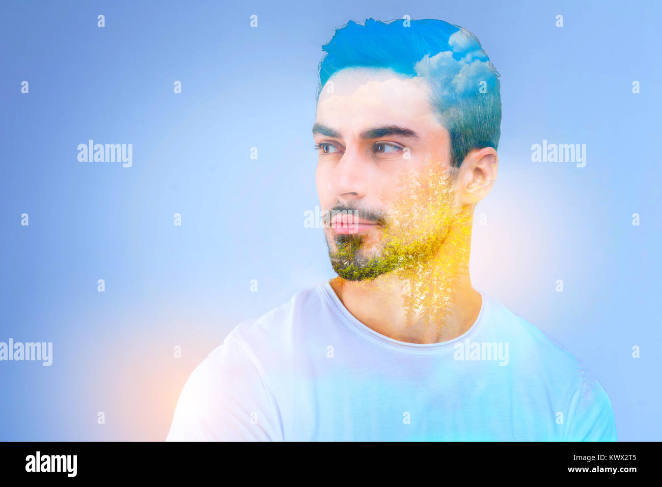 Thoughtful pleasant man thinking about nature Stock Photo - Alamy