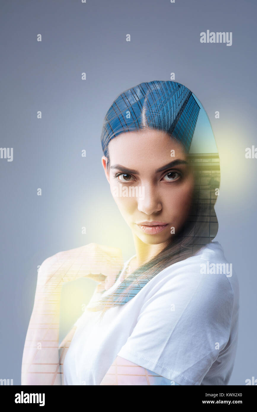 Attractive young woman looking at you Stock Photo - Alamy