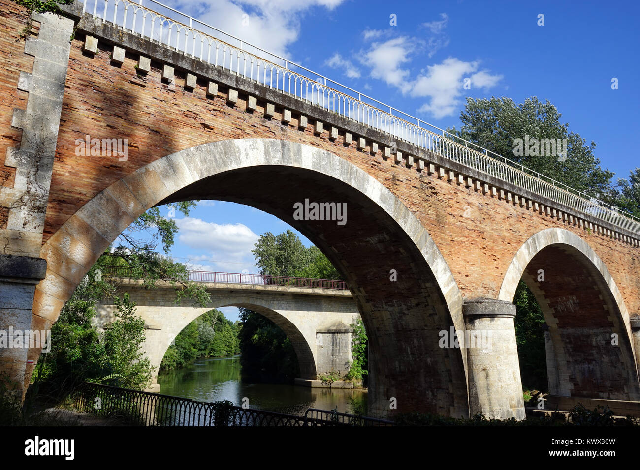 Two old arch brick bridges in France Stock Photo - Alamy