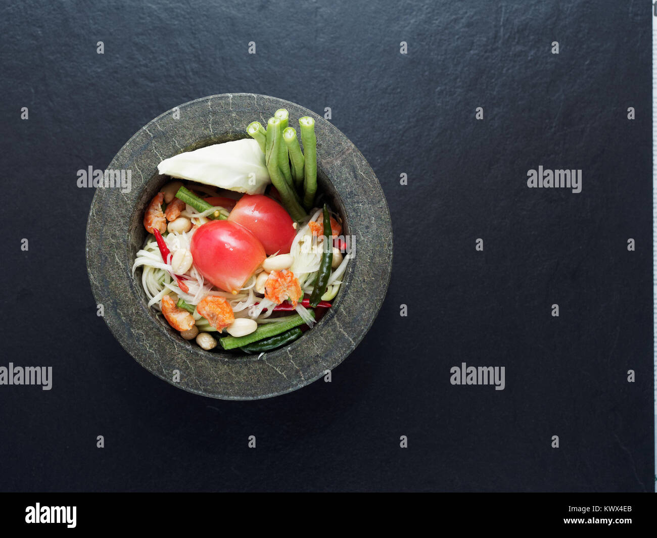 Thai green papaya salad, Som Tam, famous stree food of Thailand in ...