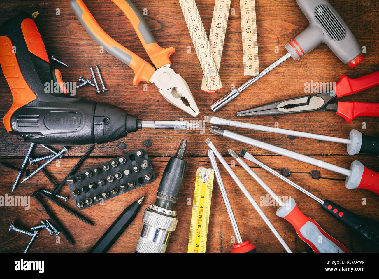 Variety of hand tools on a wooden table Stock Photo - Alamy